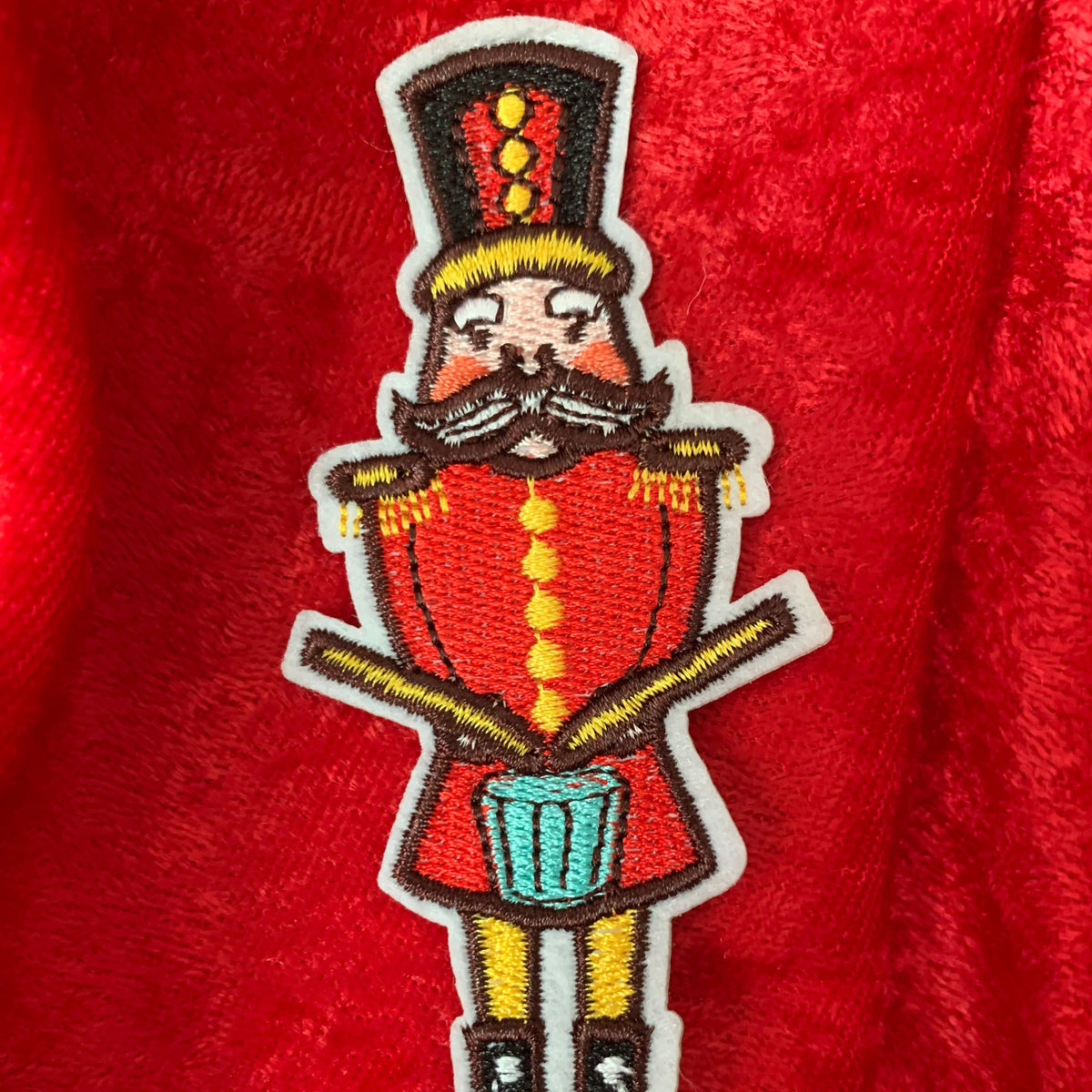 Red Nutcracker Patch – Ah! The Element of Surprise